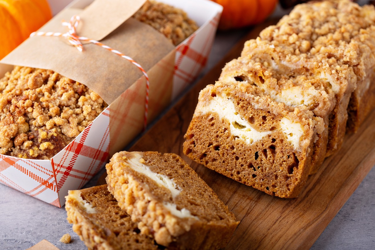 Cheesecake Filled Pumpkin Loaf with Brown Sugar Crumble | Baked by Claire